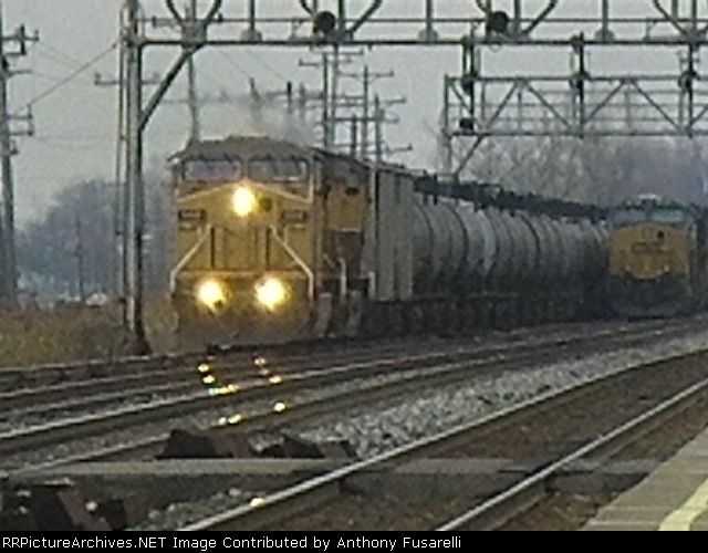 Union Pacific Ethanol train passing a six CSX unit train